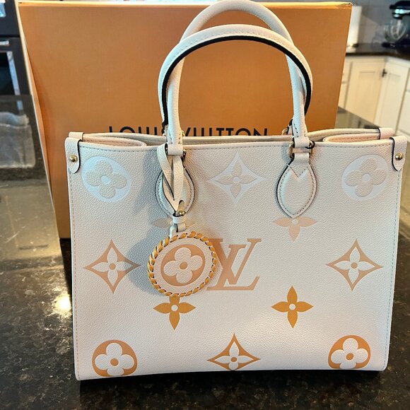 Louis Vuitton | Bags | Louis Vuitton Cream Saffron Giant Monogram ...